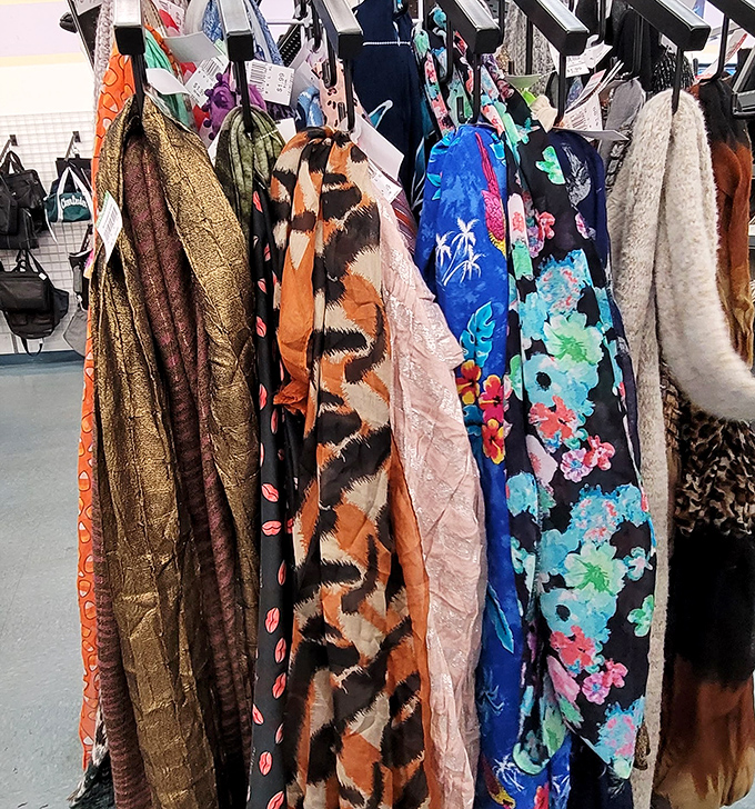 Scarves in technicolor glory – silk, cotton, and polyester flags of fashion from decades past and present.