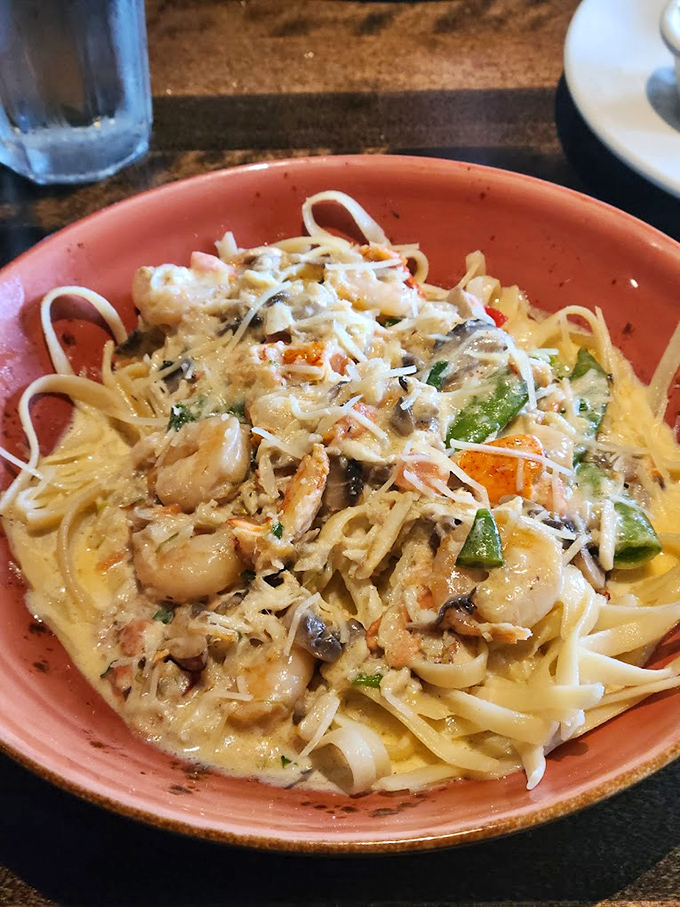 Pasta that doesn't know whether it's surf or turf, so it decided to be both. The shrimp look like they died happy.