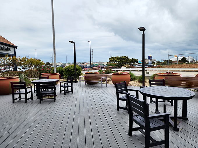 Outdoor seating provides strategic rest stops for weary shoppers who've earned a break from their bargain-hunting marathon sessions.