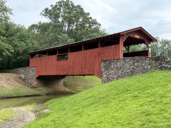 The side view reveals the bridge's elegant profile, showcasing stonework foundations that anchor this floating piece of history.