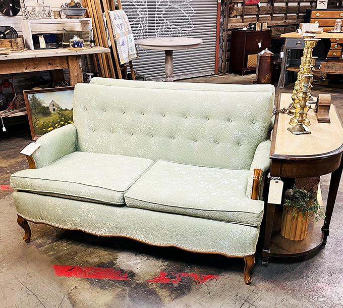 That mint-green sofa has hosted more heart-to-hearts and TV dinners than it would care to admit. Mid-century comfort with stories to tell.