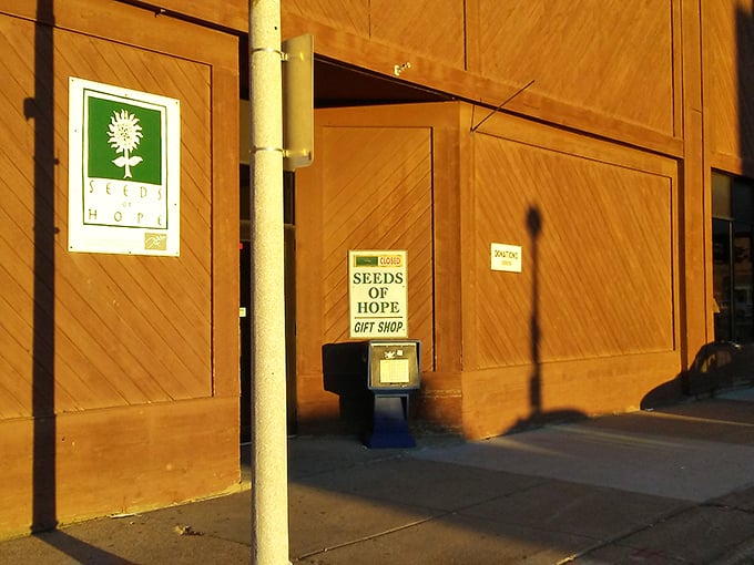 The Seeds of Hope logo glows in the evening light, a beacon for bargain hunters and community supporters alike.