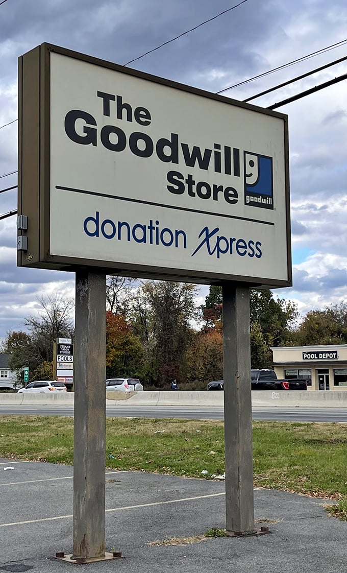The roadside sign stands tall, a humble billboard for sustainable shopping that beckons more convincingly than any flashy department store marquee.