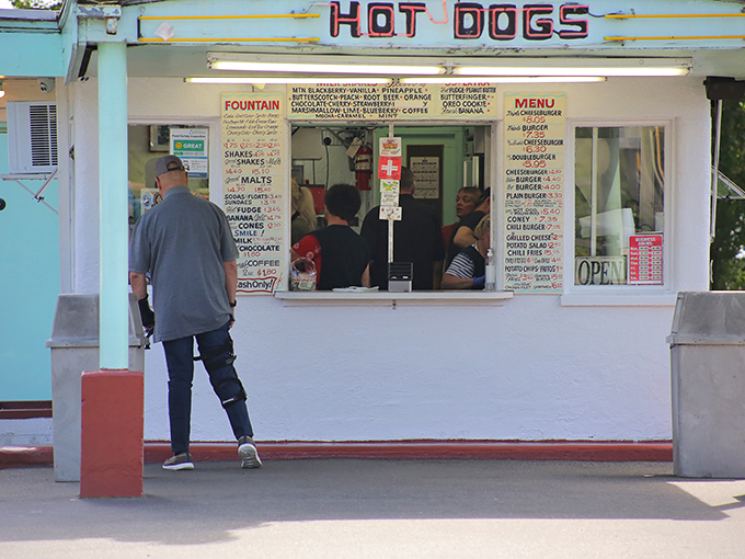 The ordering window: where dreams are placed and fulfilled. Notice the flowers&mdash;even burger joints understand the importance of curb appeal.