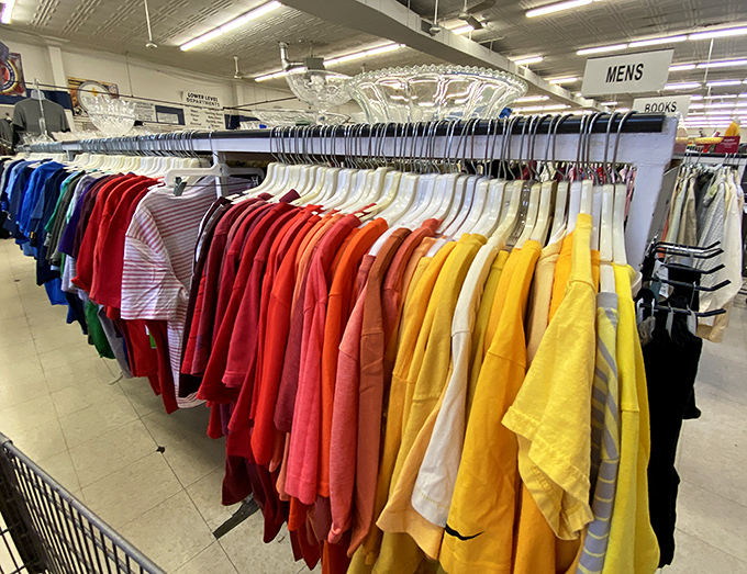 The men's section explodes with color-coded shirts that would make Marie Kondo weep with organizational joy.