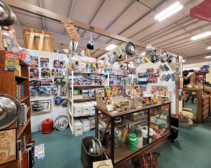 This vendor's passion for vintage toys and collectibles creates a time capsule where Gen-Xers point excitedly, saying "I had that!" while their children look on bewildered.