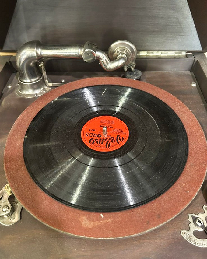 A vintage record player awaits its next spin, ready to fill someone's home with the warm, crackling sound that digital music can never replicate.
