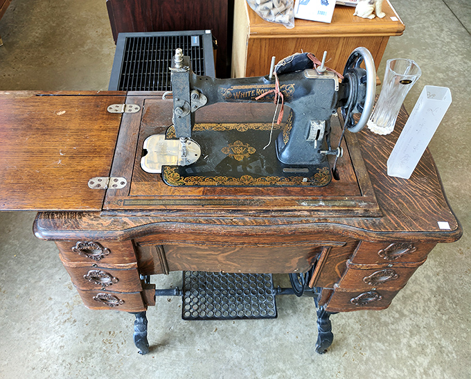 This isn't just a sewing machine; it's a piece of American craftsmanship that's survived longer than most marriages and still works beautifully.