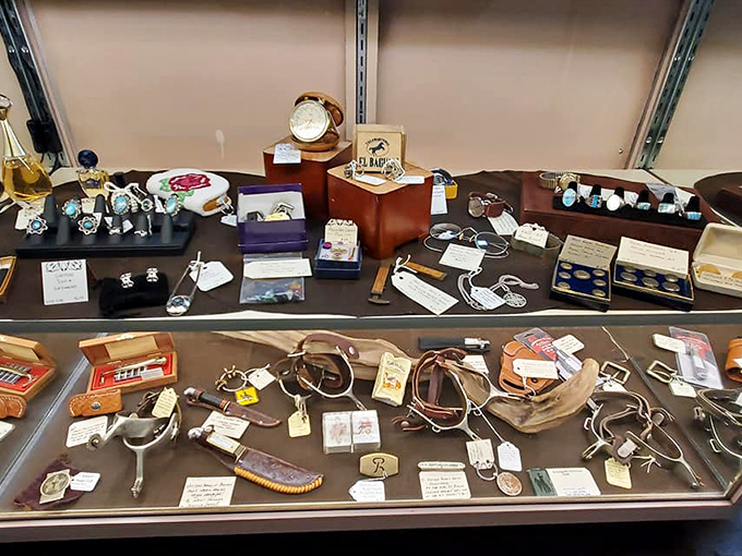 Behind glass, vintage watches and pocket knives wait patiently for new owners to wind them up and cut things.