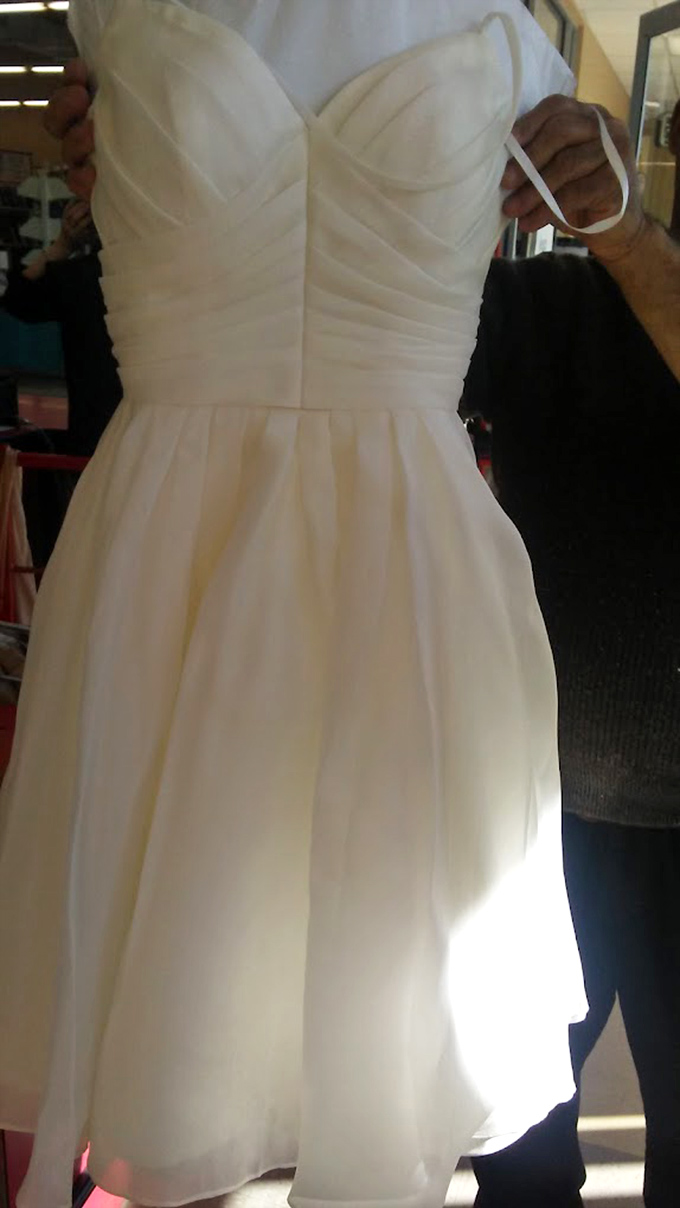 Someone's "I do" becomes your "I will!" Wedding dress discoveries like this make thrift shopping feel like winning the lottery.