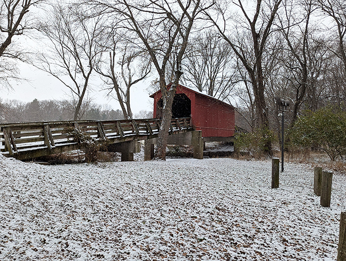 Winter transforms the bridge into a scene worthy of the best holiday cards&mdash;red siding against fresh snow creating a contrast that photographers dream about.