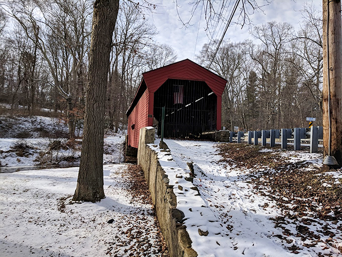 Winter transforms Bartram's Bridge into a scene worthy of the best holiday cards. Snow-dusted and serene, it's Pennsylvania's past preserved in ice.