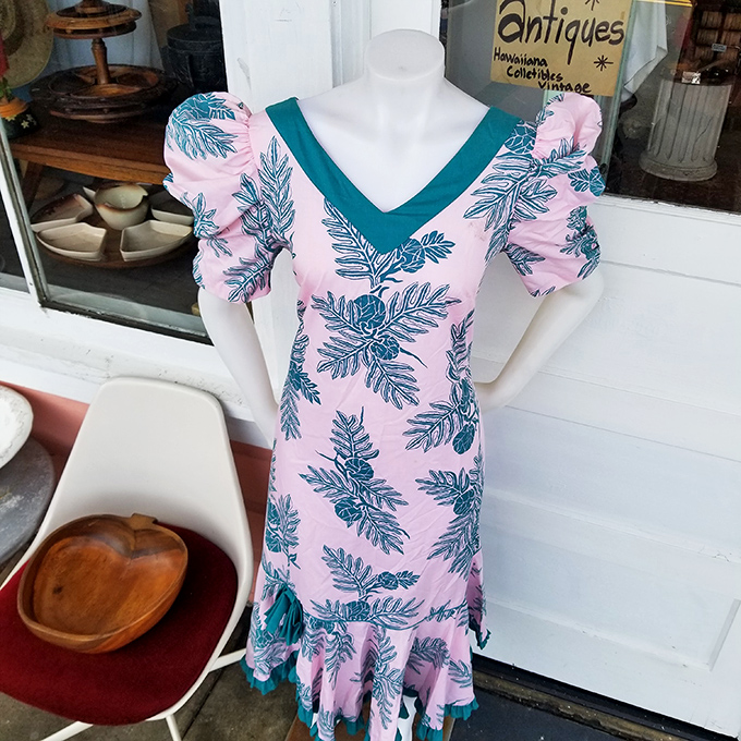 Tropical elegance that never went out of style. This vintage Hawaiian dress whispers stories of sunset cocktails and swaying palm trees.