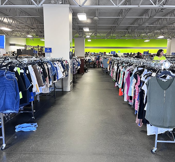 Color-coded clothing racks make finding your size a breeze. The retail-like organization system transforms thrifting from chaotic to methodical.