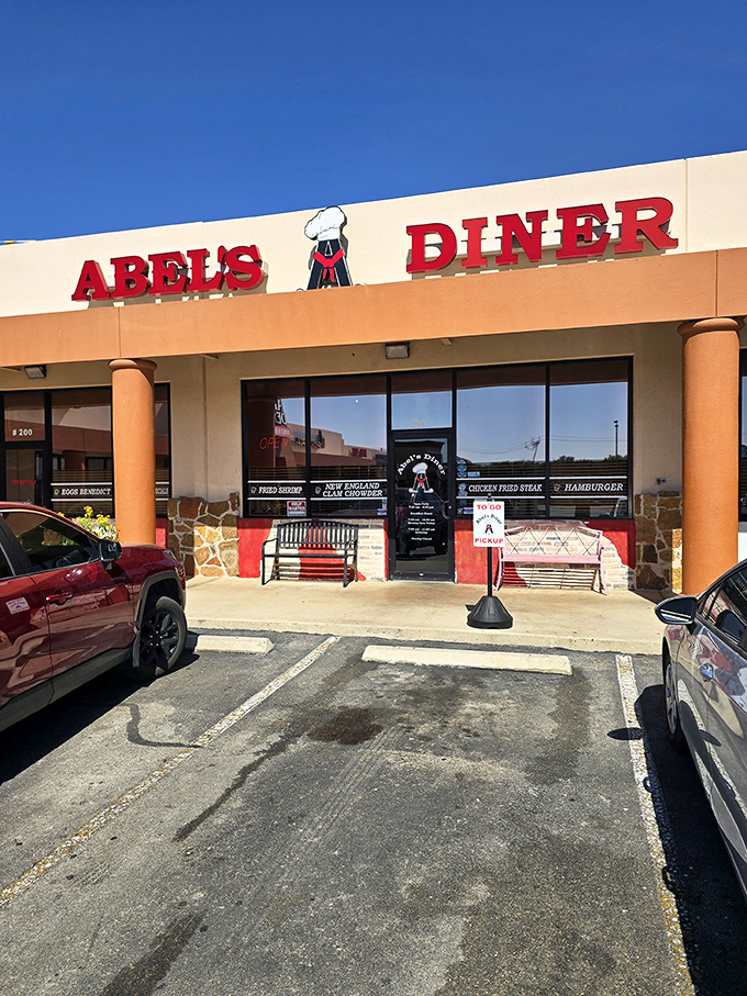 Abel's Diner's cheerful exterior with its chef dog logo promises breakfast with personality in Schertz, Texas.