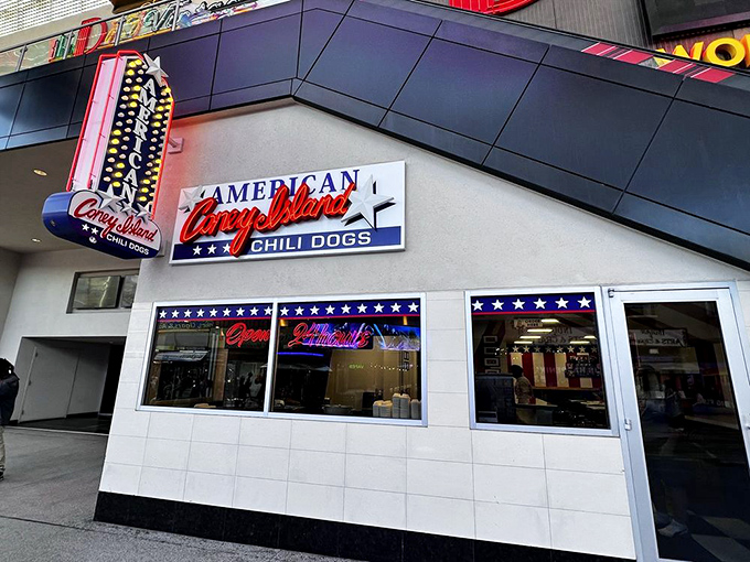 American Coney Island's patriotic facade stands proudly among Vegas glitz, offering Detroit-style simplicity in a city of excess.