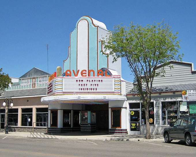Avenal's classic theater marquee advertises entertainment at prices that feel wonderfully stuck in time.