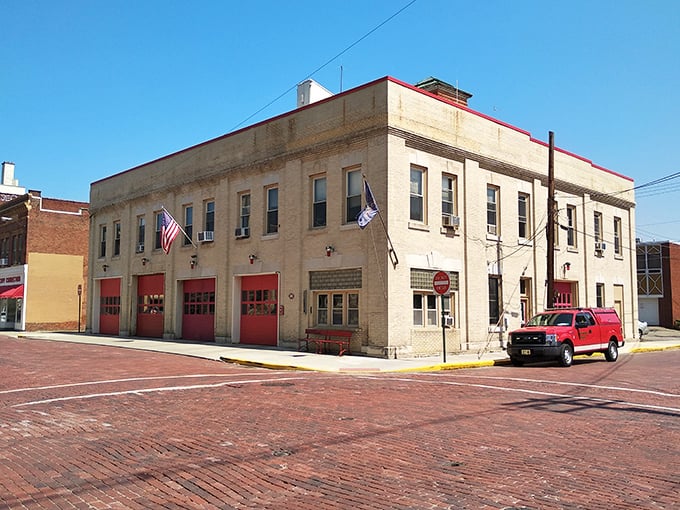 This historic firehouse with bright red doors stands as Bradford's community guardian, where retirees find both safety and remarkably affordable living.