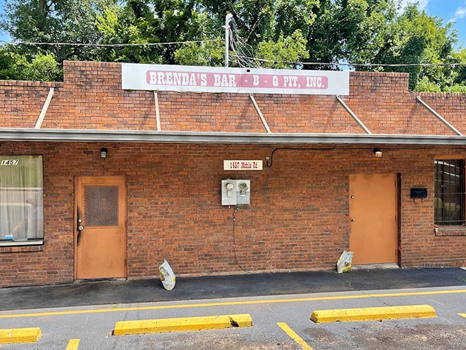 Brenda's brick fortress of flavor doesn't need fancy signage when the smoke signals have been calling folks for decades.