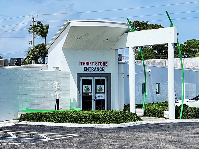 The modern white entrance of Charity Thrift Stores offers a surprisingly upscale approach to secondhand shopping.