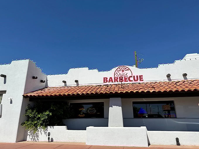 Eric's white adobe-style building with red tile roof gives barbecue a distinctly Southwestern architectural home.