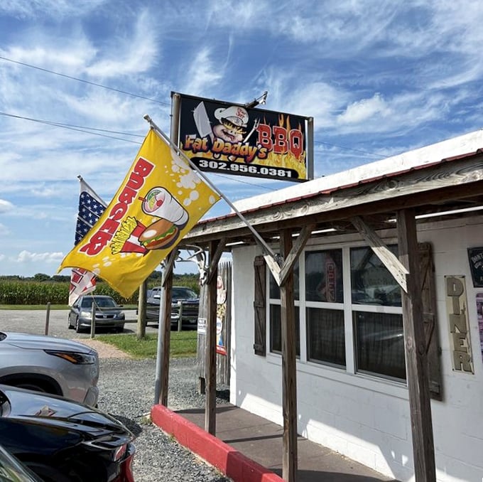 Roadside barbecue at its finest, where the flags wave proudly and the smoke tells beautiful stories.