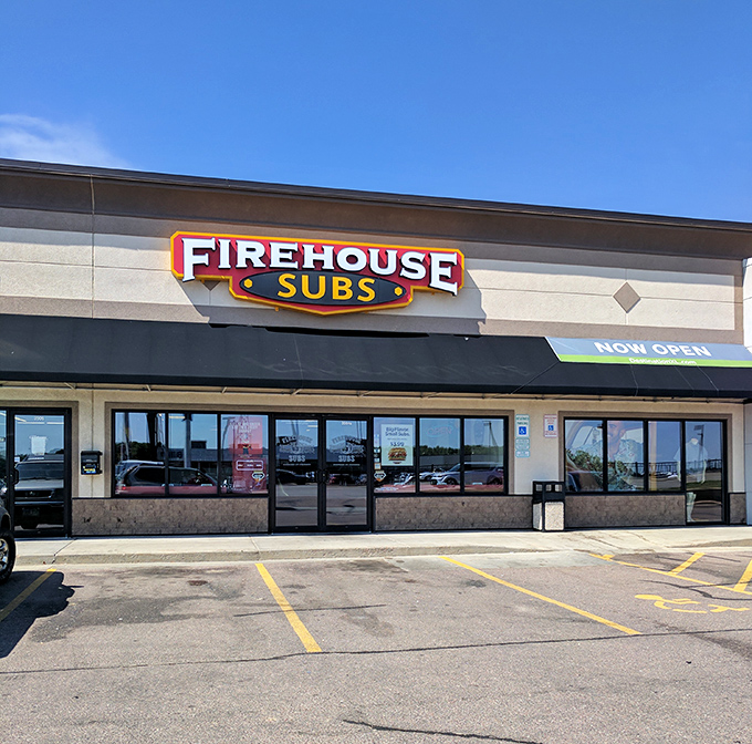 Hot subs with a side of community spirit. The firefighter theme isn't just decoration&mdash;it's a mission you can taste.