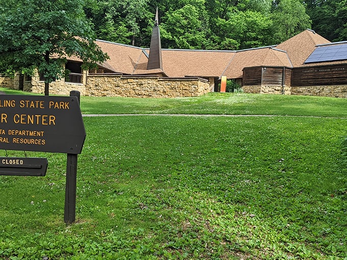 Fort Snelling's visitor center blends seamlessly with its natural surroundings, like an architectural chameleon in the woods.