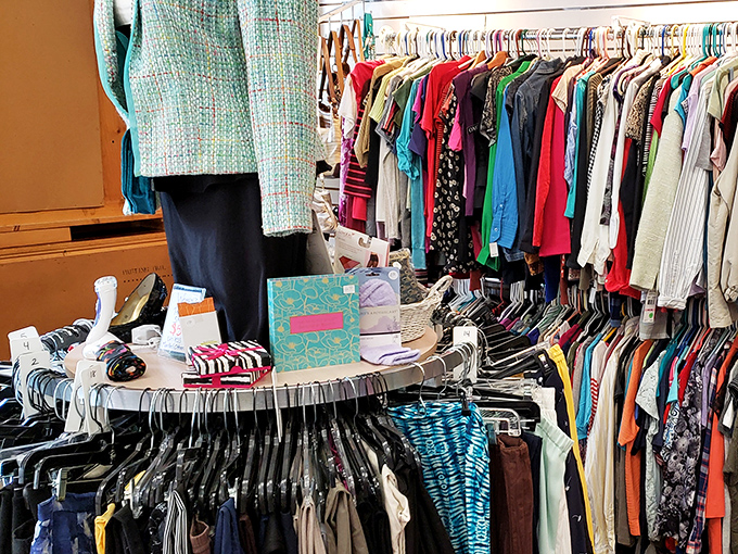 This colorful clothing display shows the organized chaos that makes thrift shopping such an addictive treasure hunt.