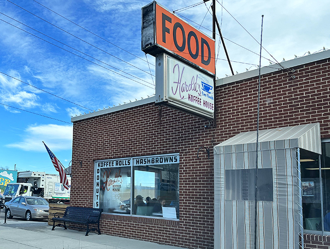 Harold's Koffee House may look modest, but that vintage "FOOD" sign promises morning meals that locals line up for.