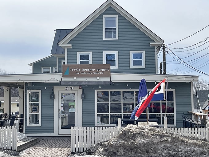 Little Brother's charming blue house and white picket fence make burger dreams feel right at home.