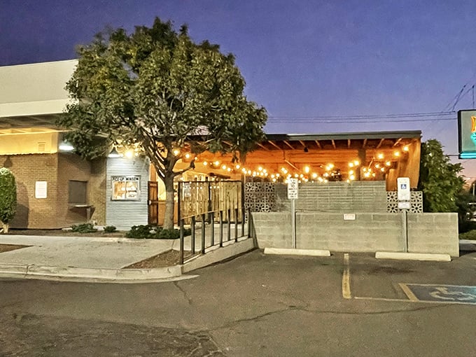 Little Miss BBQ's Sunnyslope location glows with promise as string lights illuminate the evening BBQ pilgrimage.