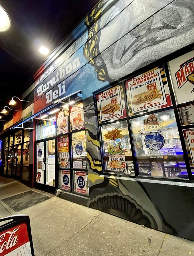 Marathon Deli's colorful storefront comes alive at night. Those menu boards in the window tell stories of late-night sandwich salvation.