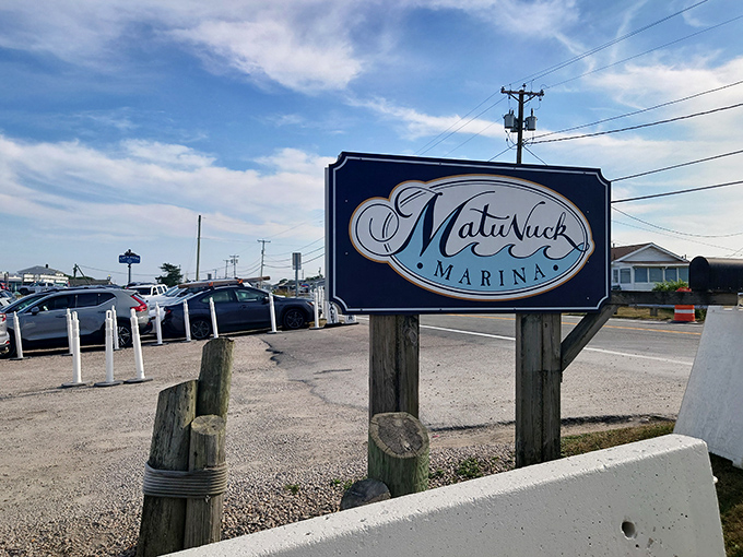 The simple marina sign doesn't reveal the culinary magic happening just steps away &ndash; where pond meets plate.