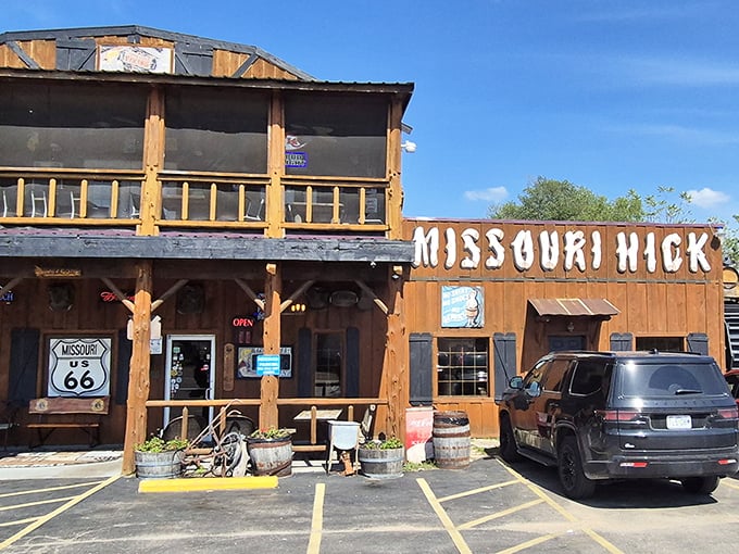 Missouri Hick's rustic wooden facade looks straight out of barbecue dreams. That Route 66 charm houses some seriously good Ozark smoking skills!