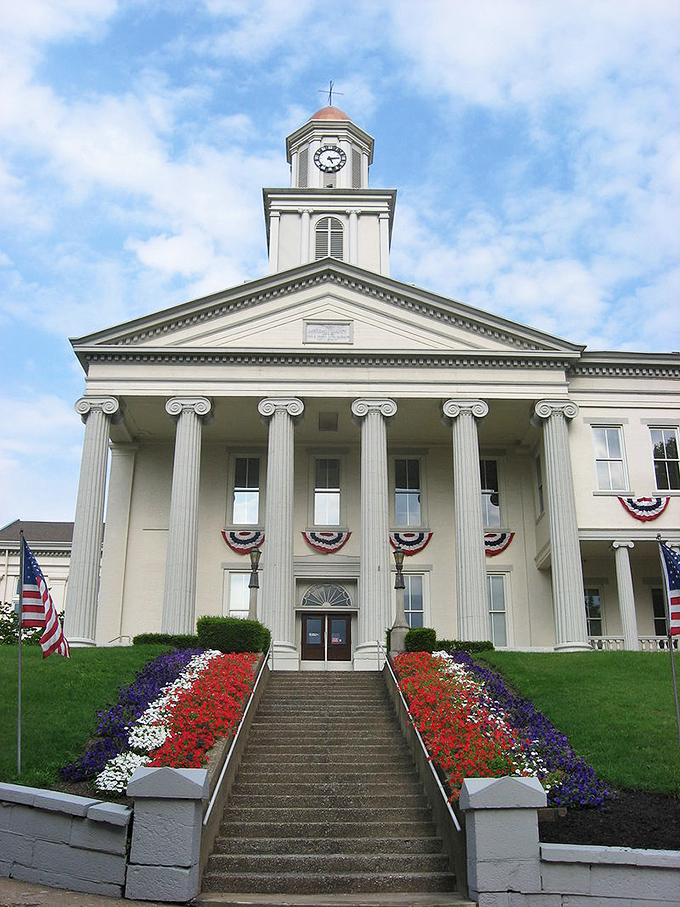 New Castle's stately courthouse with its grand staircase and patriotic display showcases the town's pride and historic character.