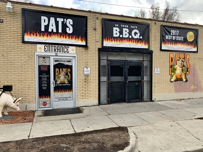 Pat's flaming signage warns you&mdash;this BBQ isn't playing around! The cartoon pig seems to say, "Enter at your own delicious risk!"