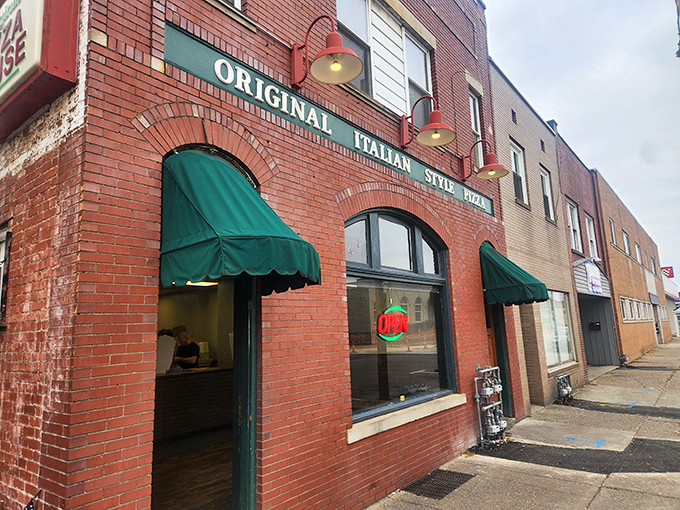 Police Station Pizza's classic brick building houses one of Pennsylvania's most unique pizza styles &ndash; cheese on after baking!