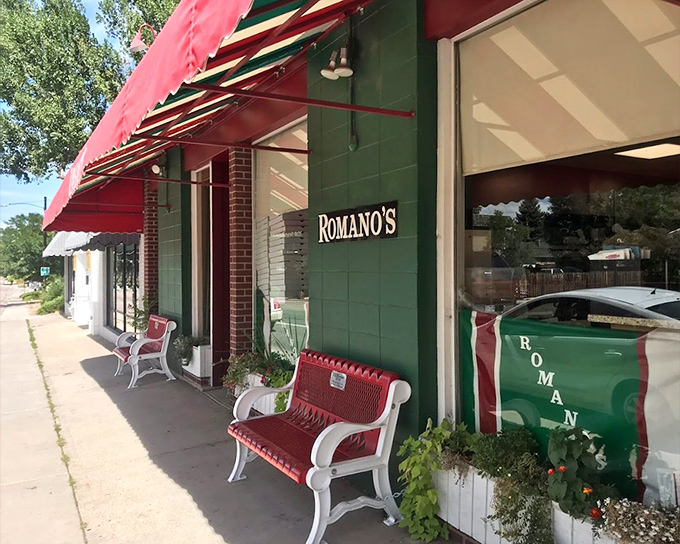 Romano's classic red awning and inviting bench create that "neighborhood Italian joint" vibe every town needs.