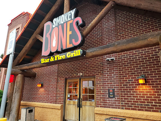 Smokey Bones' rustic exterior with those massive timber accents sets the perfect mountain lodge vibe. BBQ with a side of cozy coming right up!