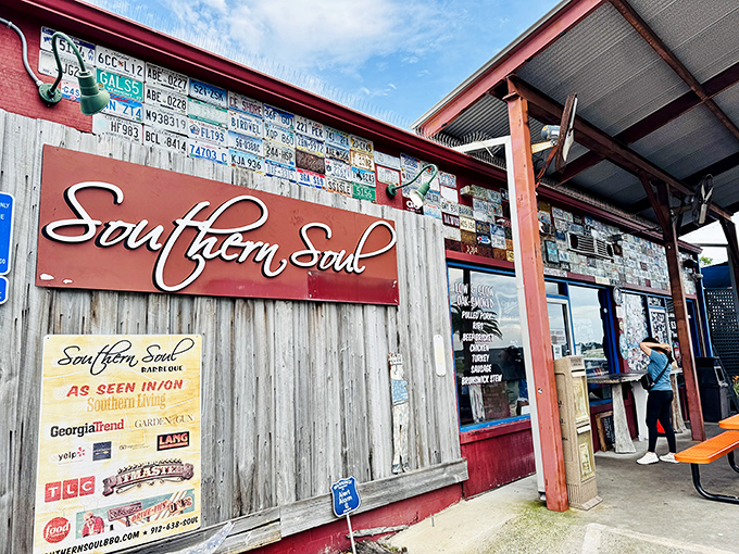Southern Soul's weathered wood and metal sign tell you this is the real deal &ndash; beach BBQ with a side of authentic coastal charm.