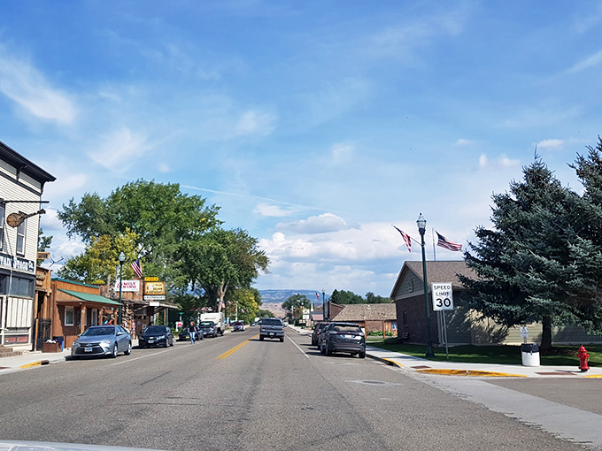 Ten Sleep's canyon setting creates dramatic red rock walls that rise like ancient monuments to time. 
