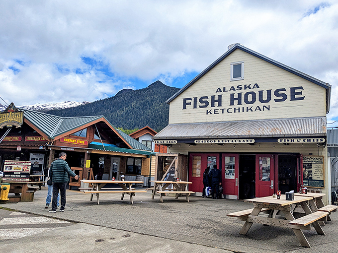 The Alaska Fish House stands proud in yellow and red. Weathered by elements, perfected by experience!