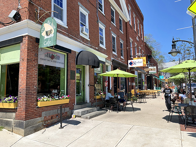 The Big Bean Caf&eacute;'s green awning and sidewalk seating create the perfect stage for Newmarket's morning coffee theater. 