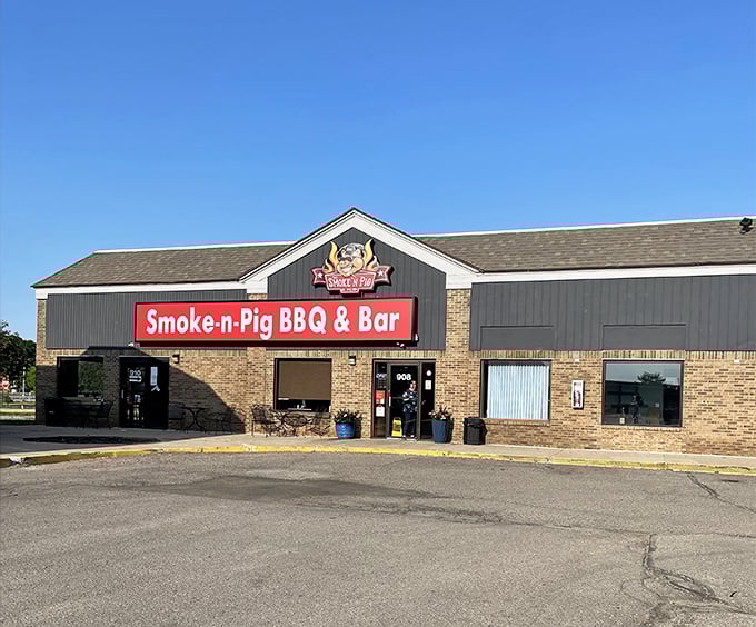 The Smoke N' Pig's bold sign makes no apologies &ndash; this is BBQ with conviction, standing proud against Michigan's blue skies.