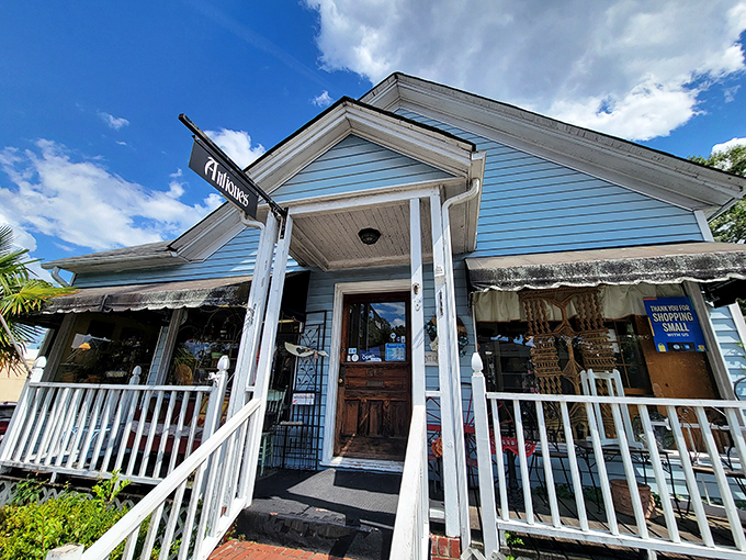 Three Rivers Antiques' charming blue exterior and welcoming porch feel more like a friend's home than a store.
