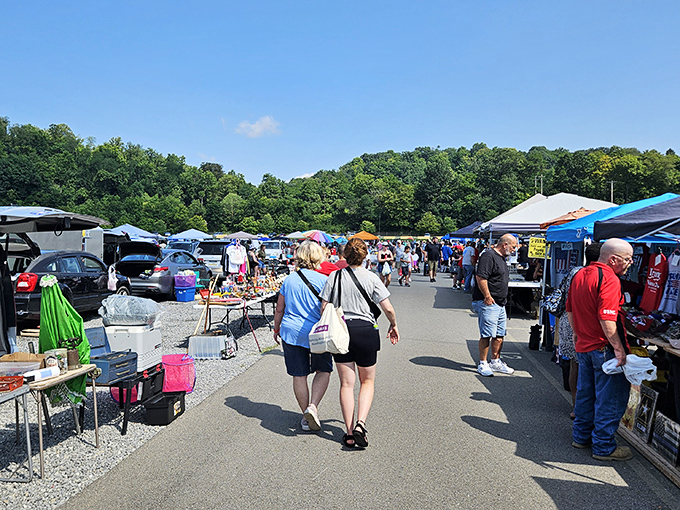 Crowds weave through vendor aisles where yesterday's forgotten items become today's perfect finds and memories. 