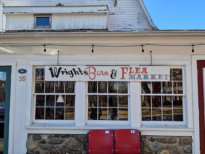 Wright's Barn welcomes treasure seekers! This charming white farmhouse exterior hides a wonderland of vintage finds and local crafts.