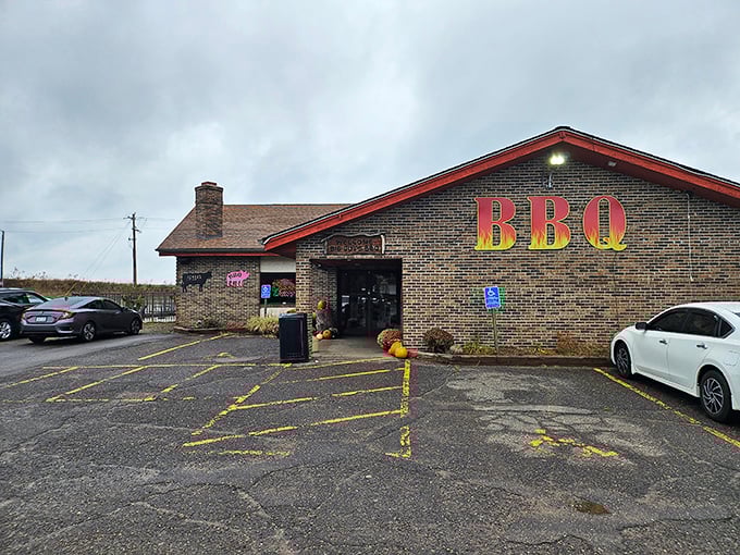 That bold "BBQ" sign isn't just advertising &ndash; it's a promise of smoky delights that this roadhouse delivers with every plate.