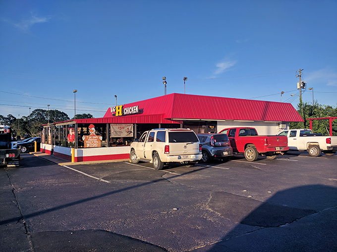The bright red roof and simple menu board tell you everything: this place knows exactly what it does best.